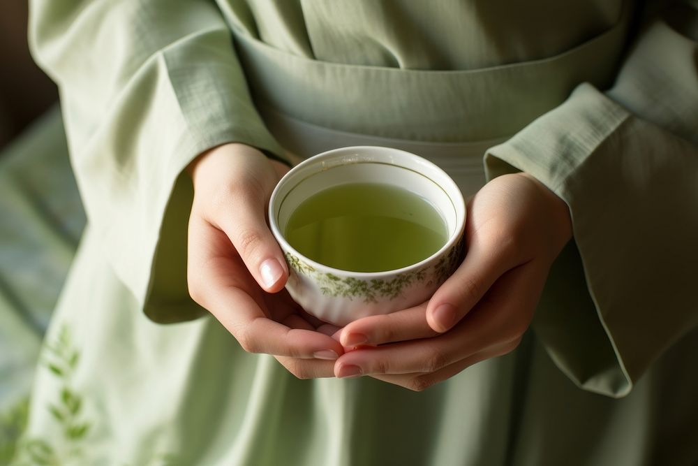 Hand hold cup green tea | Premium Photo - rawpixel