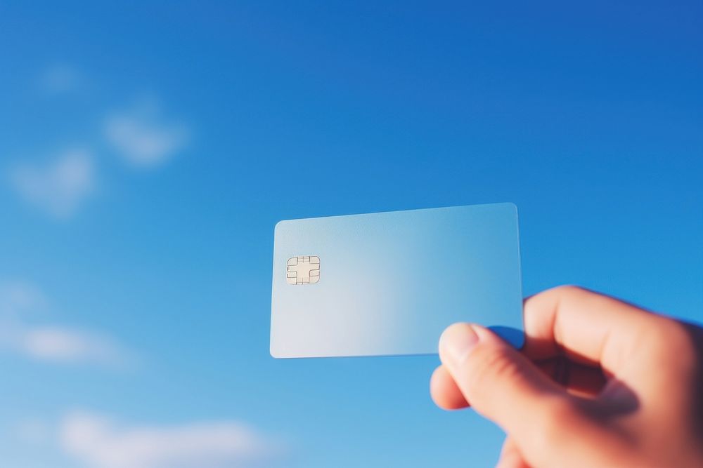 Credit card holding hand blue. | Free Photo - rawpixel