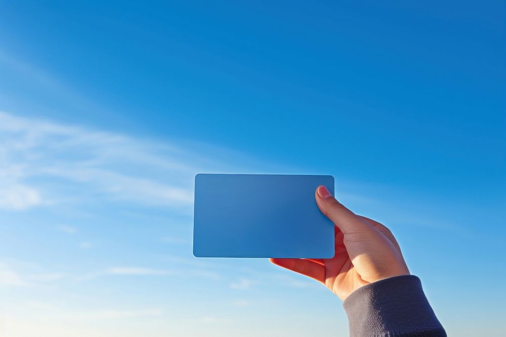 Credit card holding hand blue. | Free Photo - rawpixel