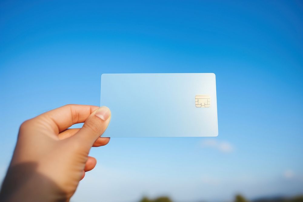 Credit card holding hand blue. | Premium Photo - rawpixel