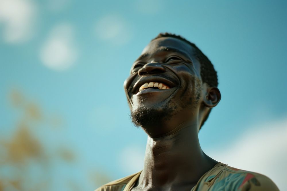 Smiling man laughs outside laughing | Free Photo - rawpixel