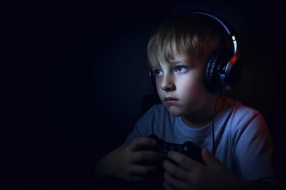 Kid playing video games photography | Free Photo - rawpixel