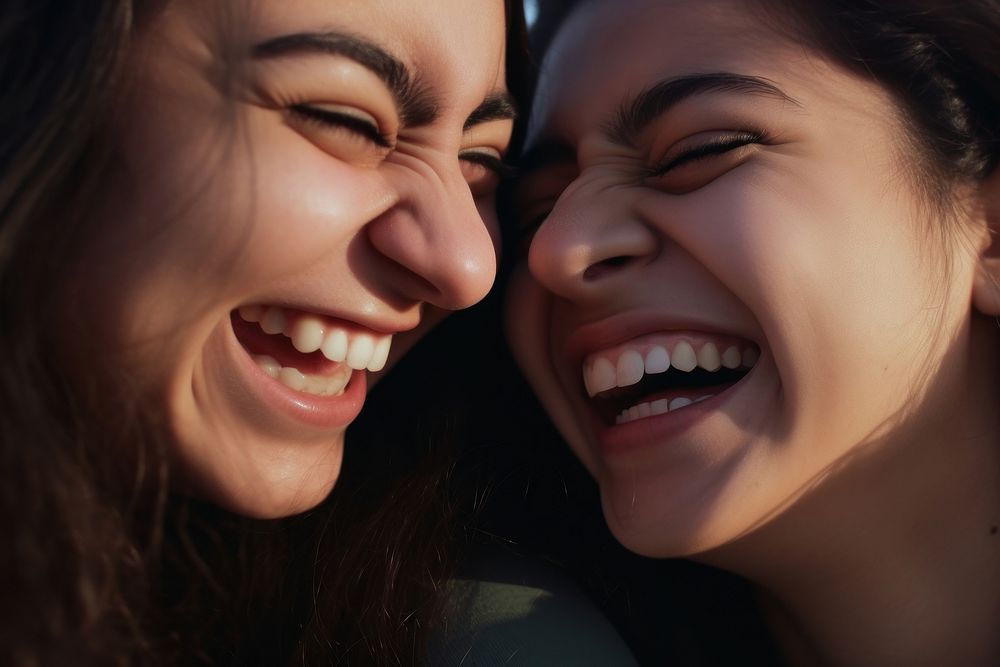 Two Hispanic laughing together adult | Free Photo - rawpixel