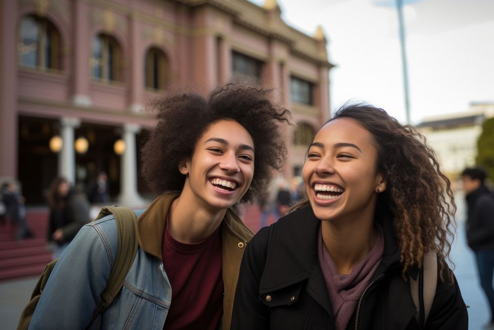 Two college students laughing outdoors | Free Photo - rawpixel