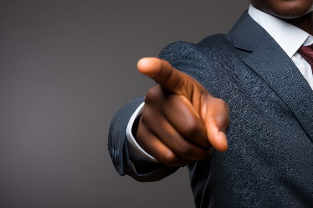 Affrican american businessman hand pointing | Premium Photo - rawpixel