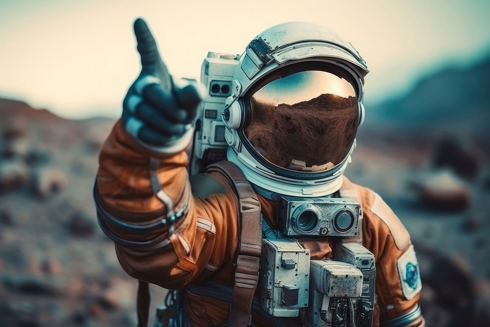 Astronaut thumbs-up astronaut exploration electronics | Free Photo - rawpixel