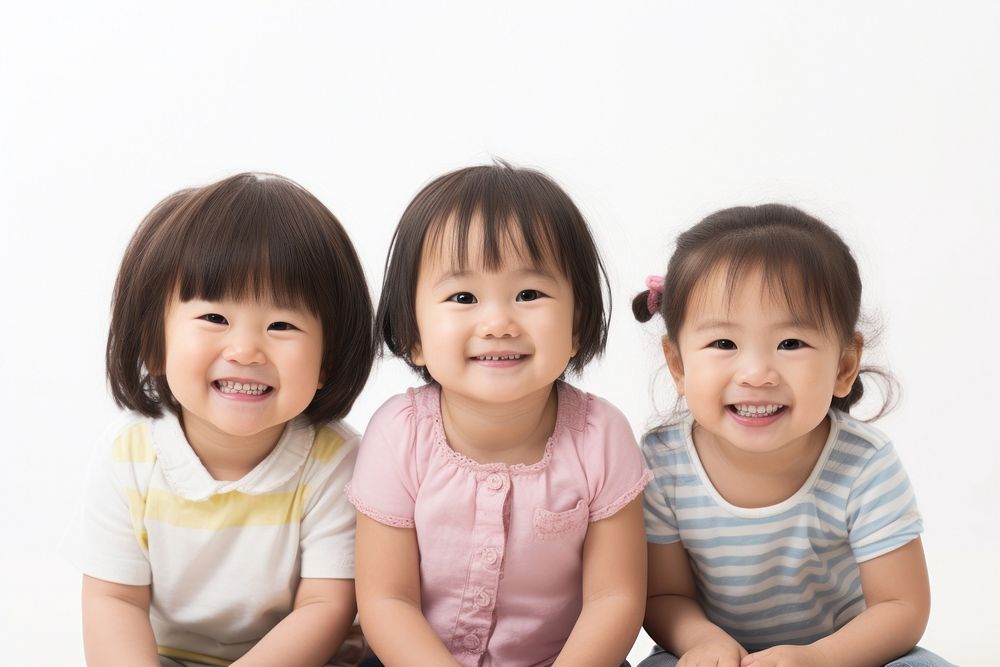 Happy japanese children sitting family | Free Photo - rawpixel