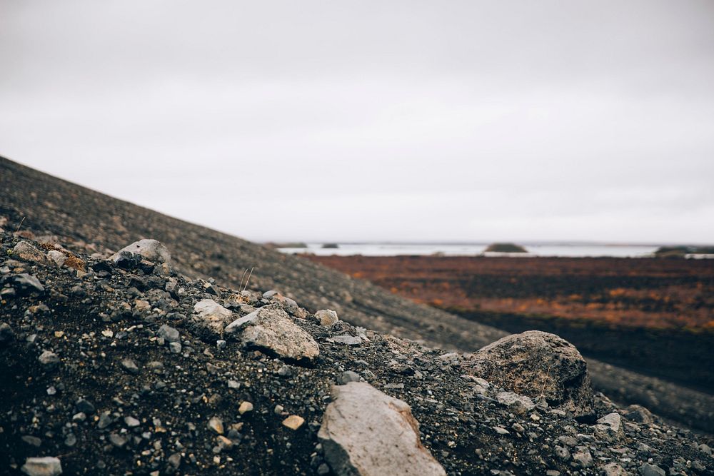 Volcanic rocks sliding black sand. | Free Photo - rawpixel