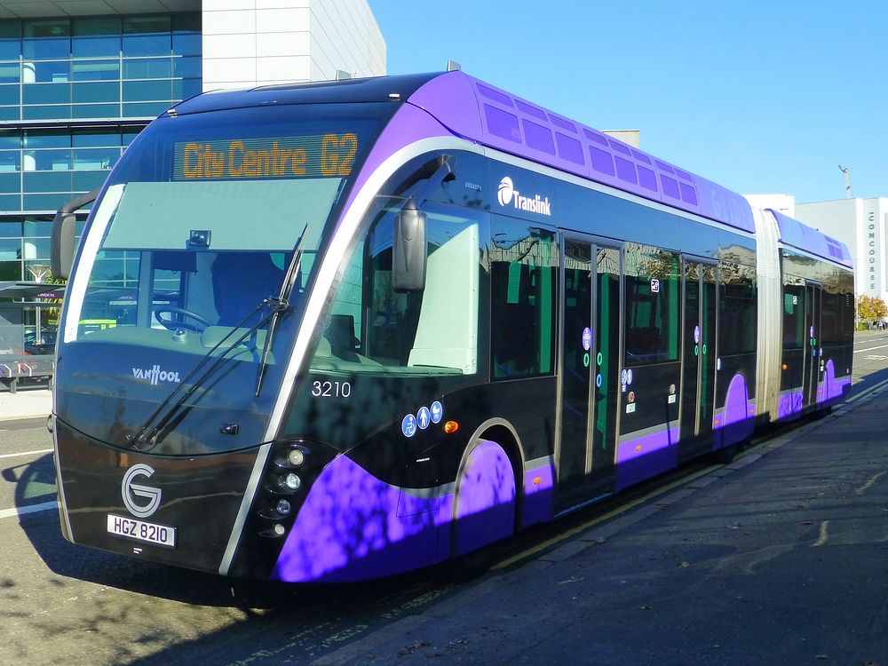 Van Hool Exqui.City bus on route | Free Photo - rawpixel