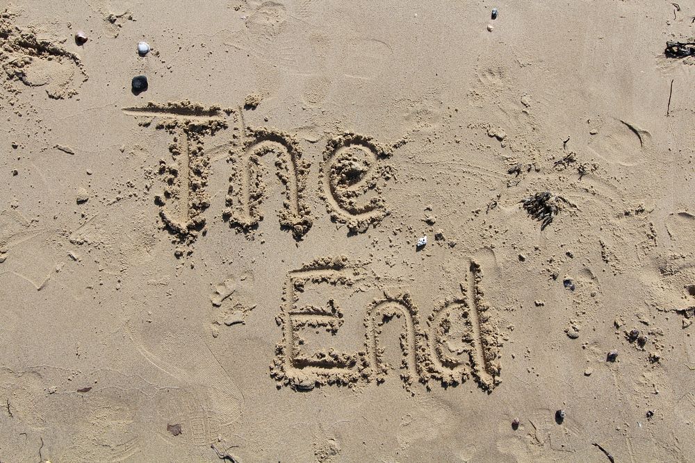 The end written in sand. | Free Photo - rawpixel