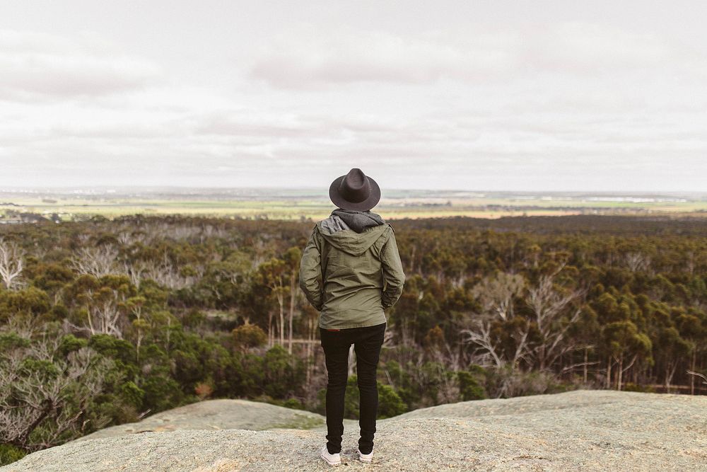 Free person forest cliff photo, | Free Photo - rawpixel