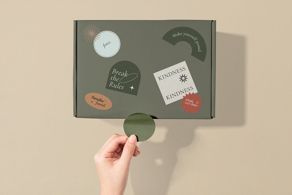 Mailing box, hand attaching sticker, | Premium Photo - rawpixel