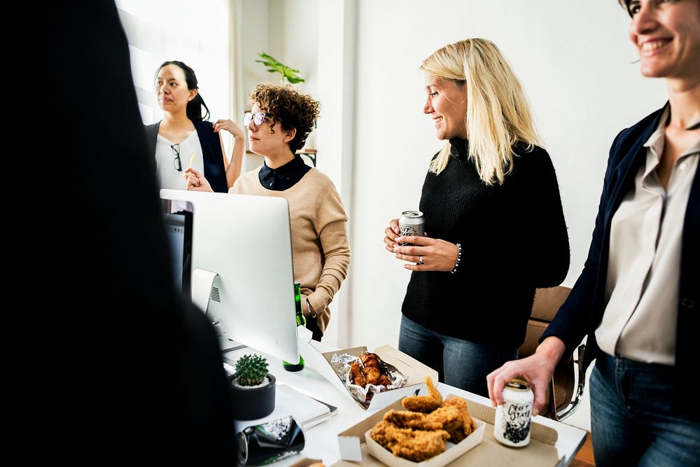 Co-workers working together in a room | Premium Photo - rawpixel