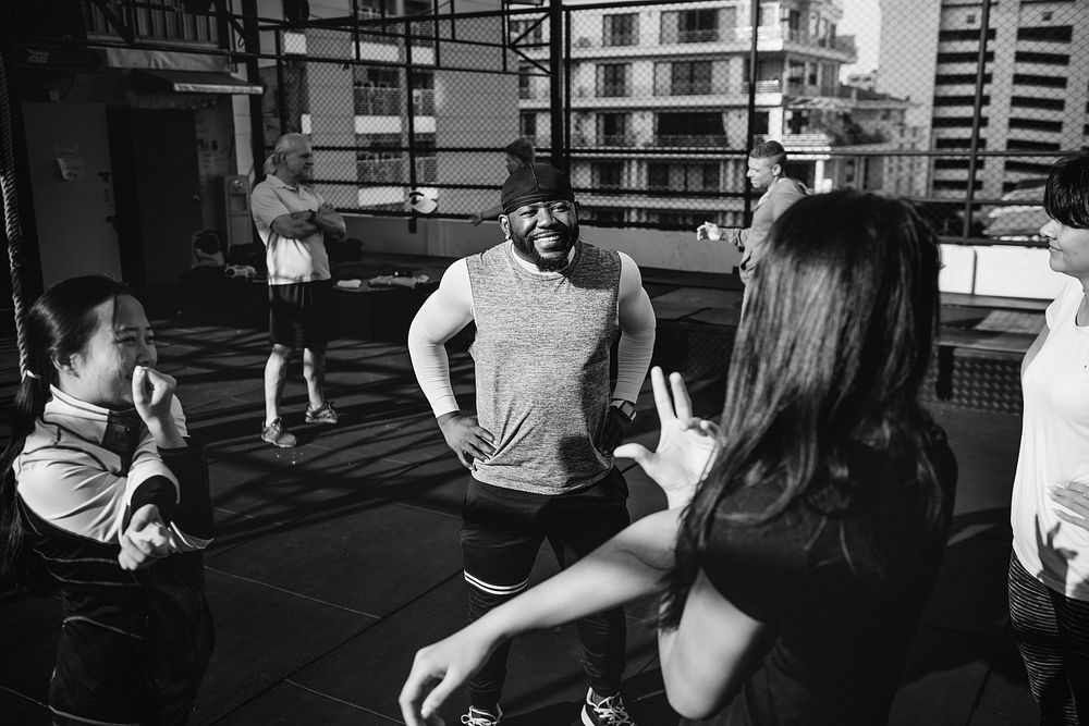 People exercising at fitness gym | Premium Photo - rawpixel