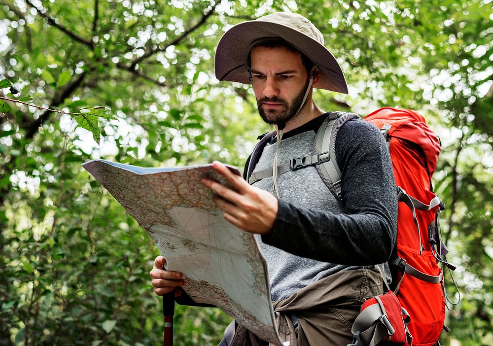 Map checking in the forest | Premium Photo - rawpixel