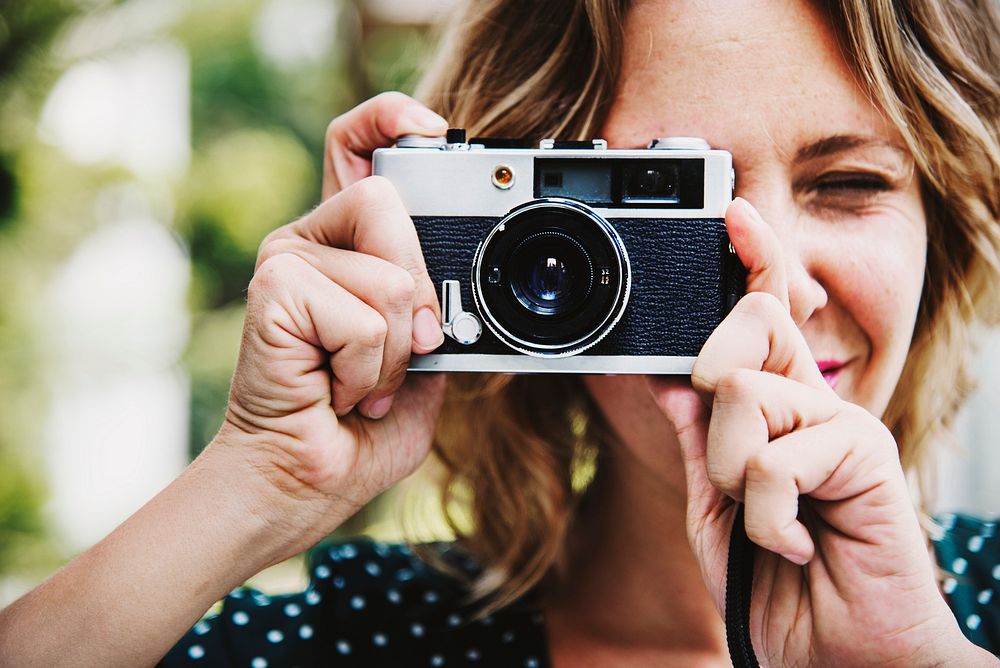 Woman taking picture with camera | Premium Photo - rawpixel