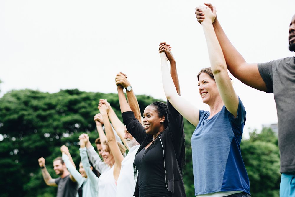 Happy diverse people holding hands | Premium Photo - rawpixel