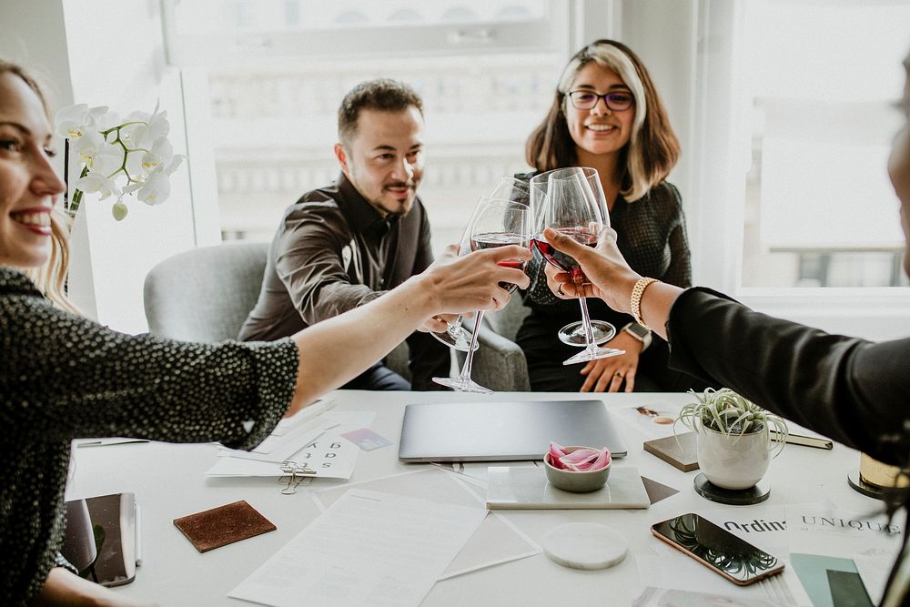 Colleagues toasting wine glasses work | Premium Photo - rawpixel