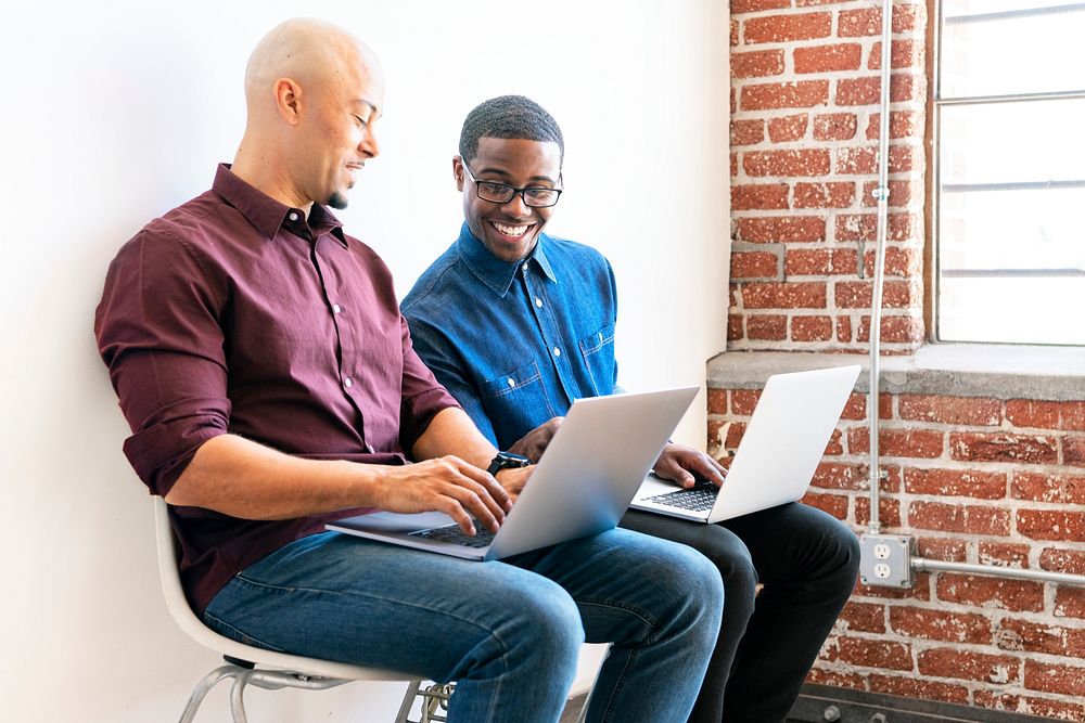 Two colleagues working together their | Premium Photo - rawpixel