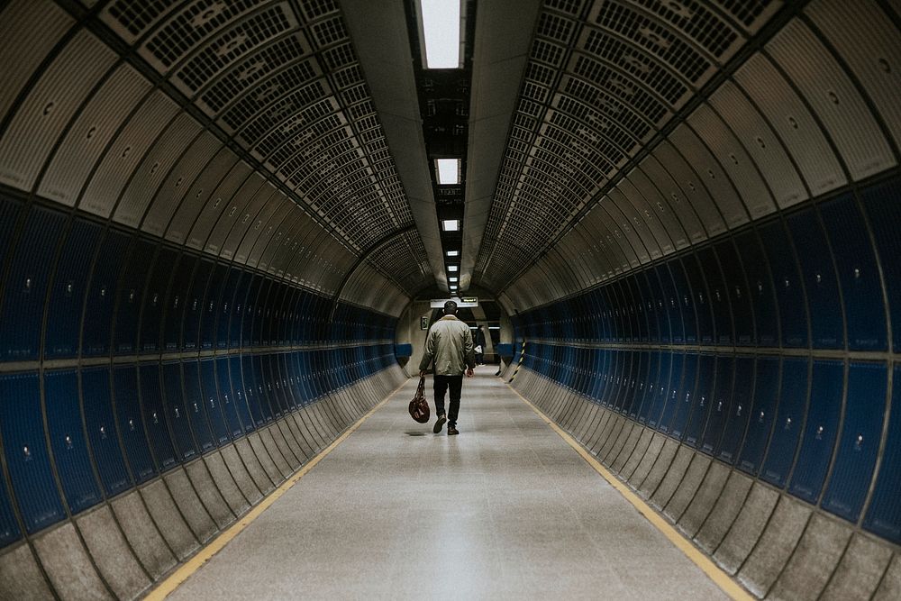 Man walking underground tunnel | Premium Photo - rawpixel