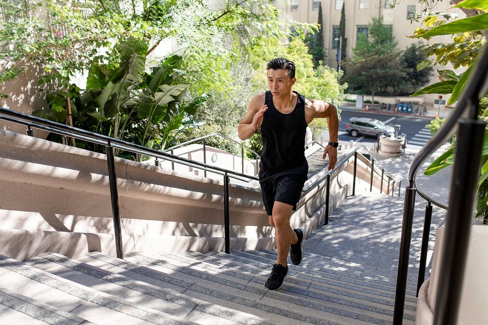 Asian man running up the steep | Premium Photo - rawpixel