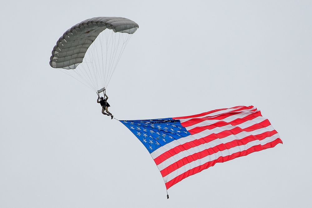 skydiver parachutes American flag opening | Free Photo - rawpixel