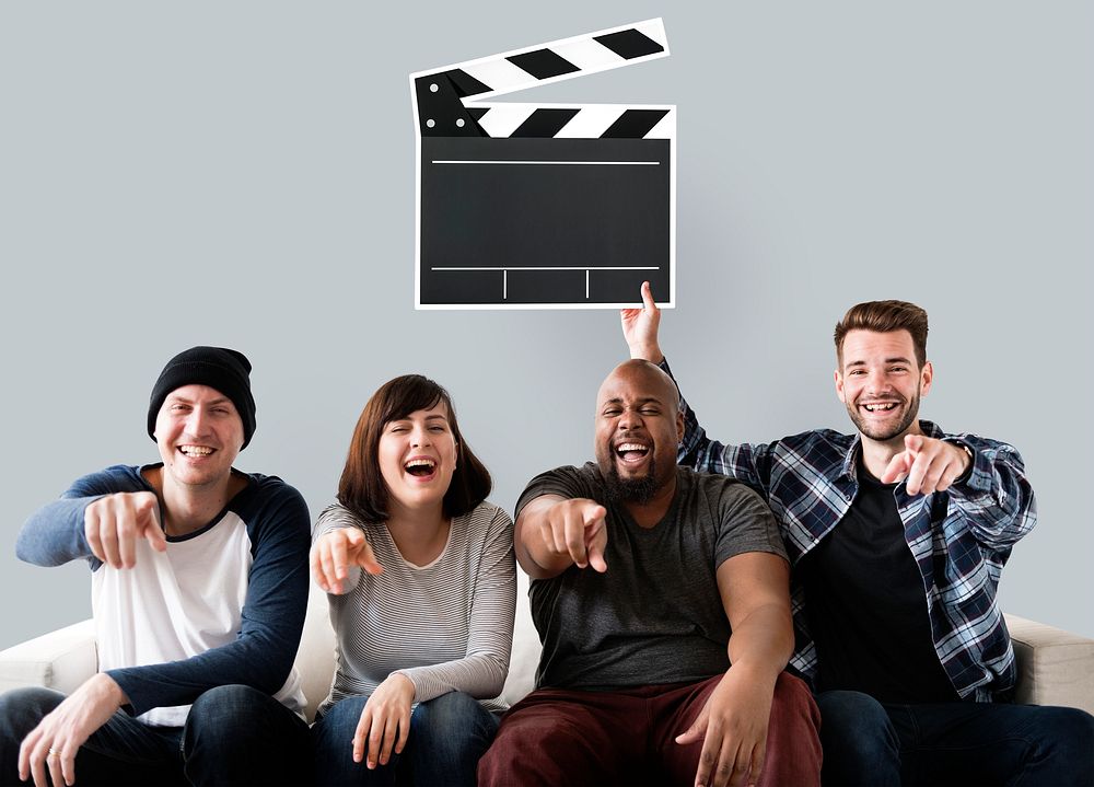 Group happy friends holding clapper | Premium Photo - rawpixel
