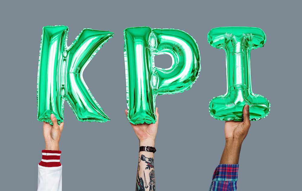 Hands holding KPI word in balloon | Photo - rawpixel
