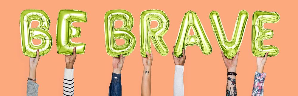 Hands holding be brave word | Photo - rawpixel