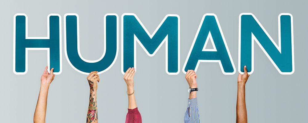 Hands holding the word Human | Free Photo - rawpixel