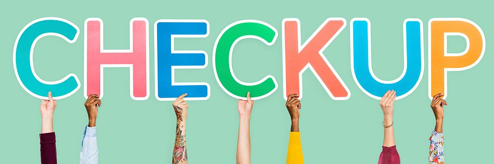 Diverse hands holding word checkup | Premium Photo - rawpixel