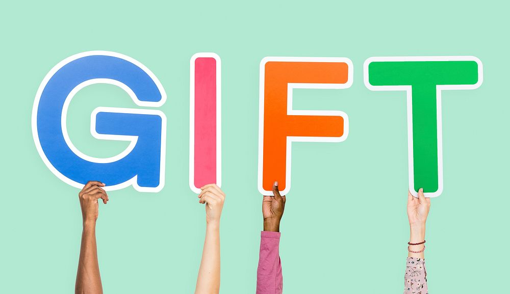 Hands holding the word gift | Free Photo - rawpixel