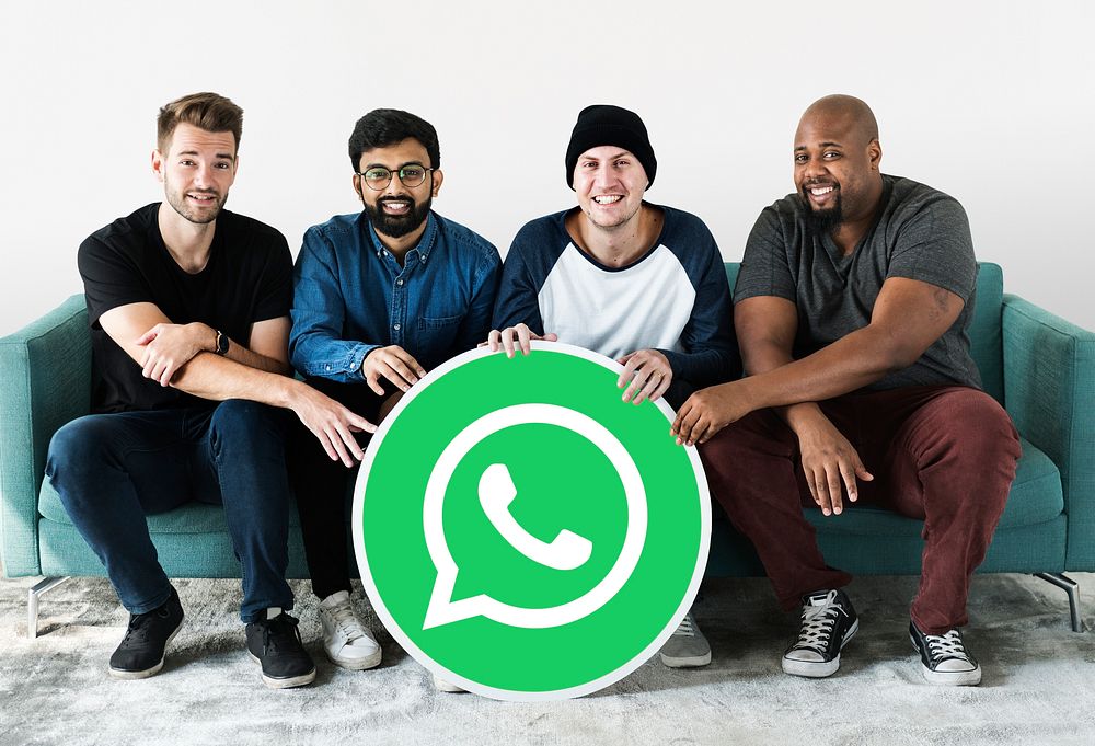 Men showing a WhatsApp Messenger | Free Photo - rawpixel
