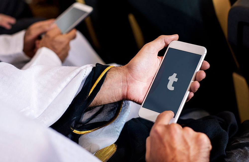 person using Tumblr application phone | Free Photo - rawpixel