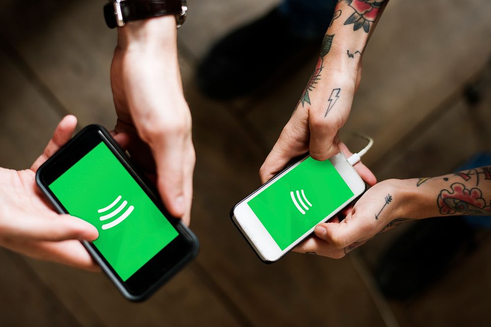 People using Spotify applications on phones | Free Photo - rawpixel