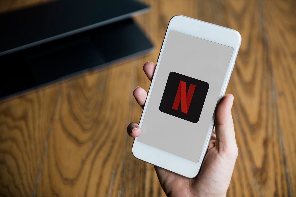 Netflix logo showing phone. BANGKOK, | Free Photo - rawpixel
