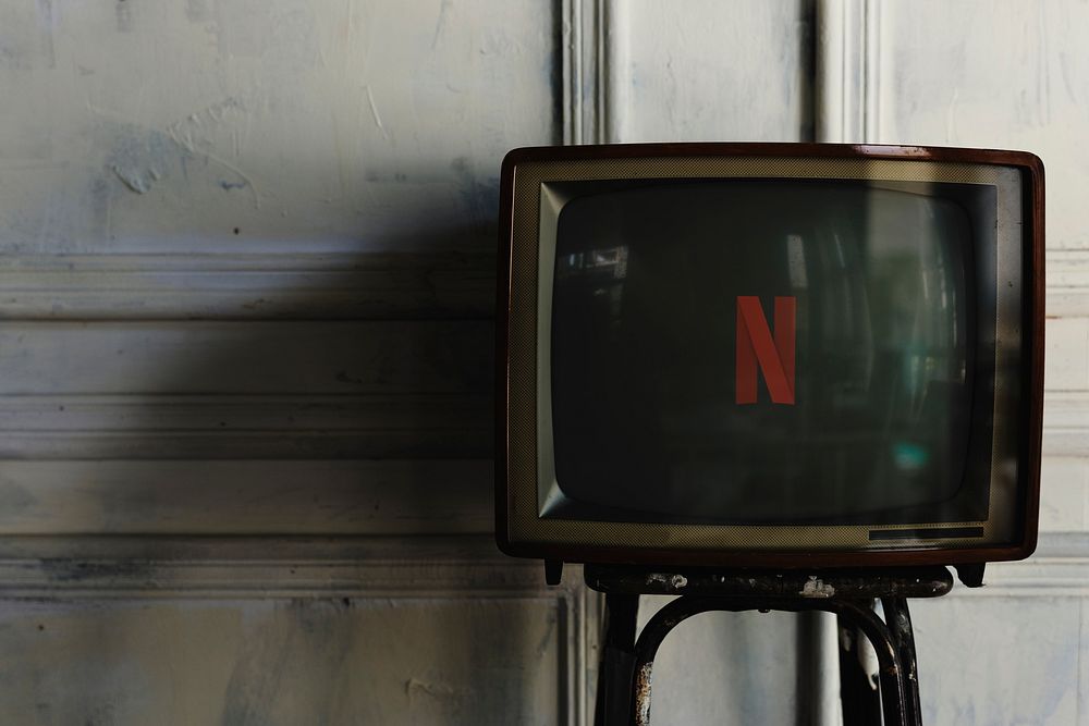 Netflix logo showing on a retro | Free Photo - rawpixel