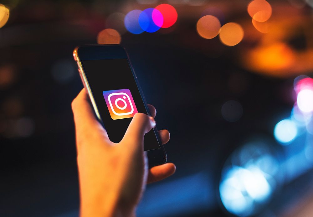Instagram logo on a mobile | Free Photo - rawpixel