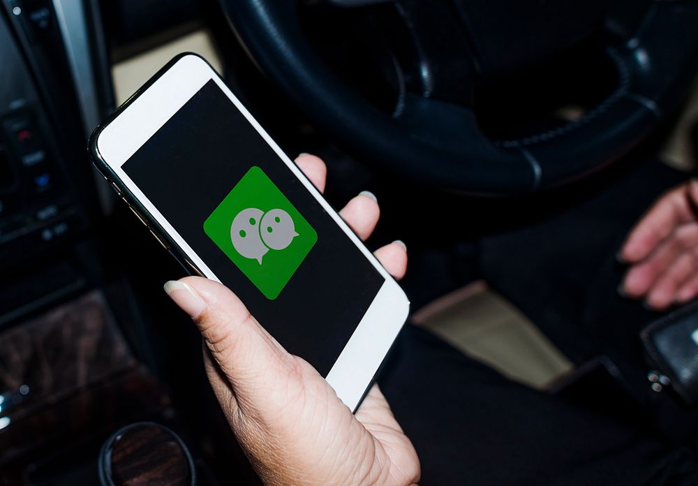 person using Wechat application. BANGKOK, | Free Photo - rawpixel