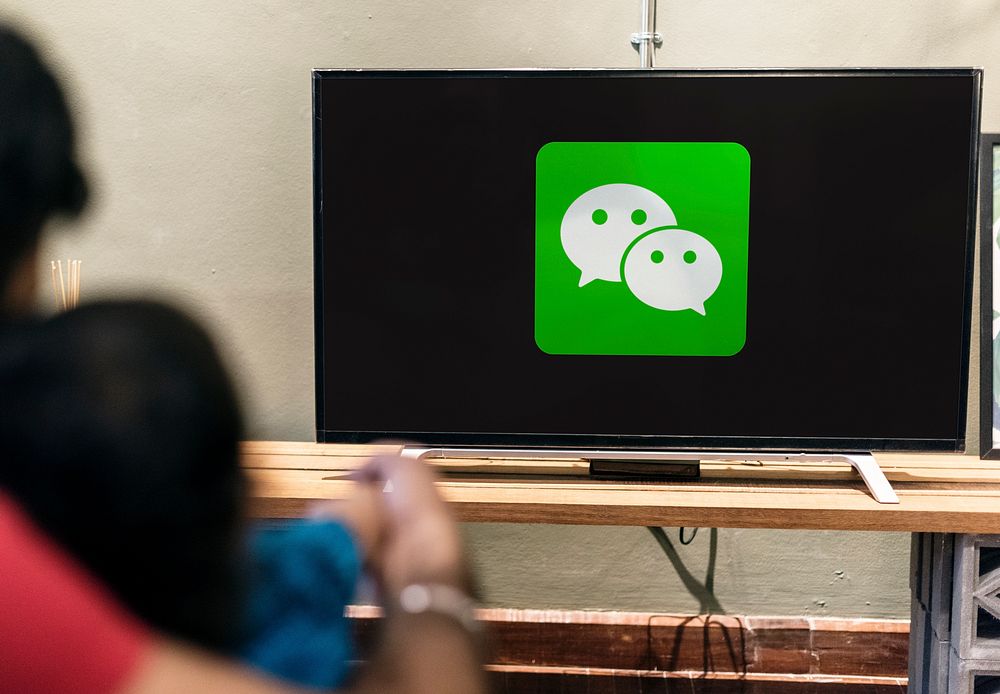 Wechat application showing TV. BANGKOK, | Free Photo - rawpixel