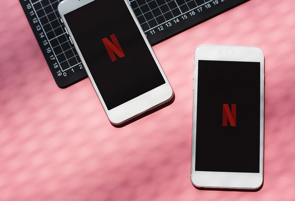 Netflix logo showing on phones | Free Photo - rawpixel