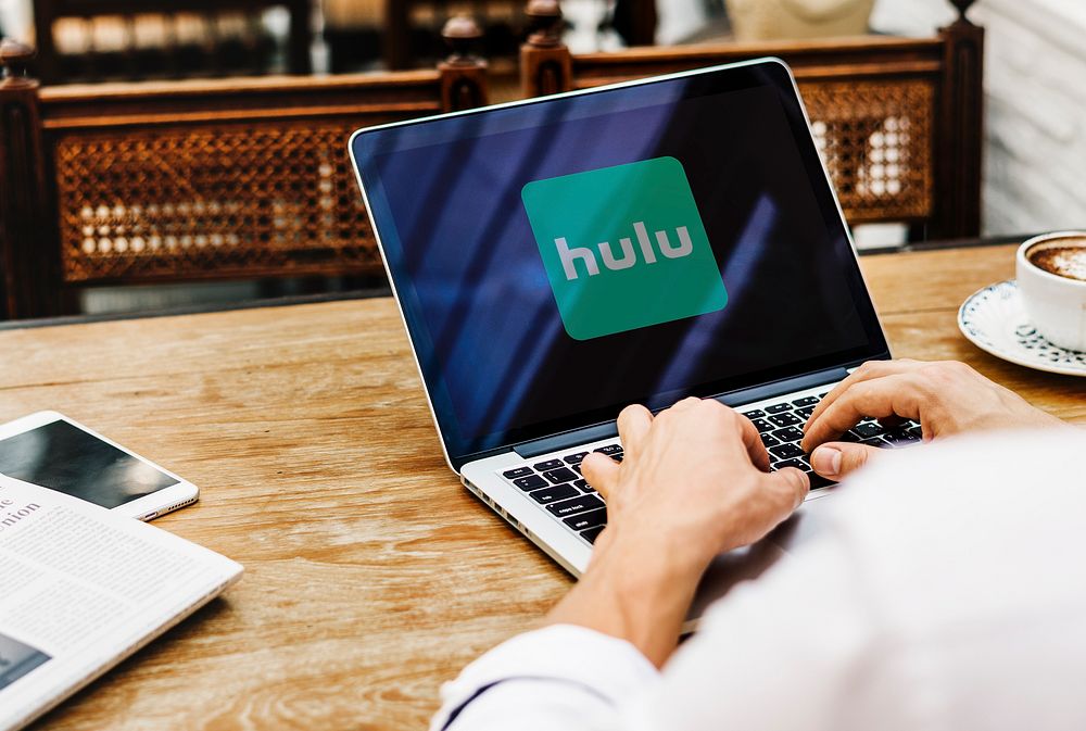 Hulu logo showing on a laptop | Free Photo - rawpixel