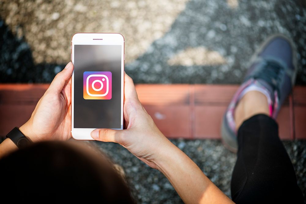 Instagram logo on a mobile | Free Photo - rawpixel