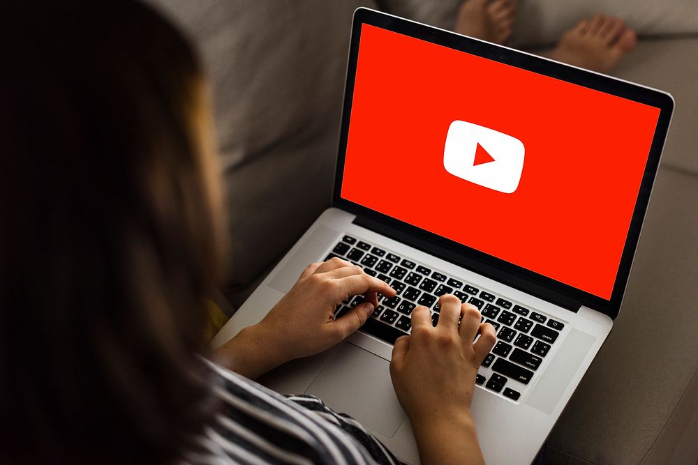 Woman using Youtube application laptop | Free Photo - rawpixel