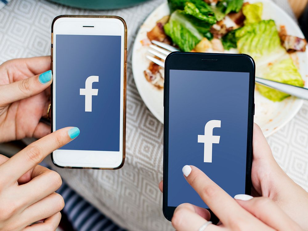People using Facebook application phones | Free Photo - rawpixel