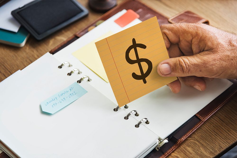 Senior hand holding dollar sign | Premium Photo - rawpixel