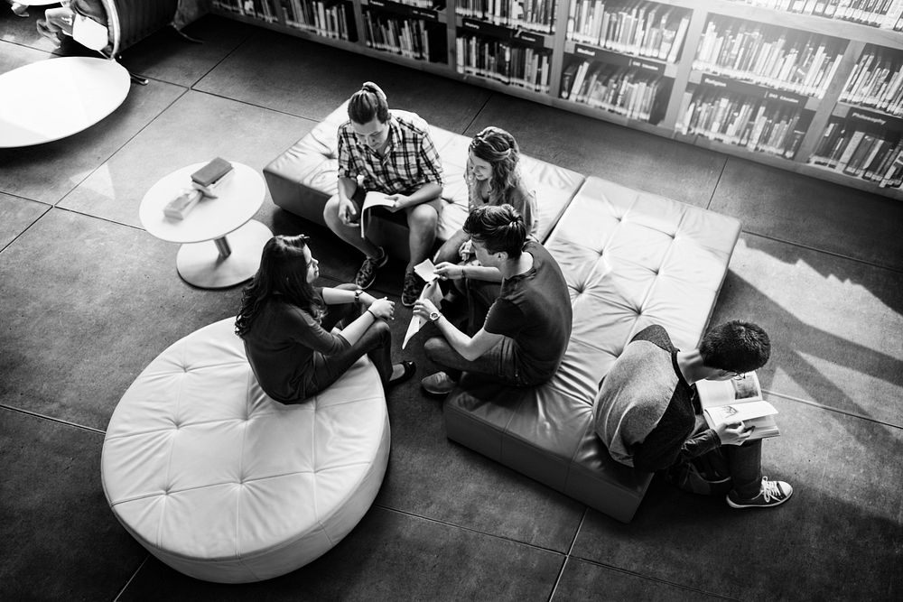 Young students school library | Premium Photo - rawpixel