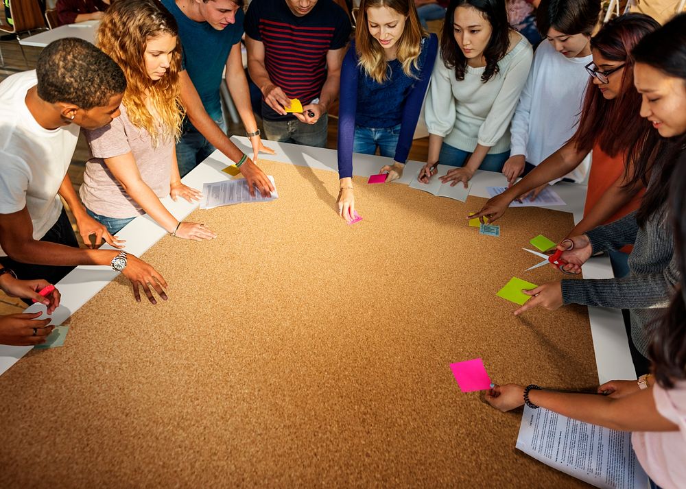 Students working on a project | Photo - rawpixel