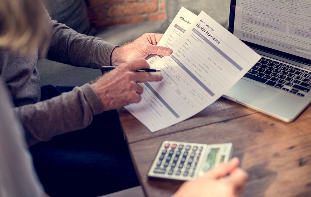 Mature Couple Insurance Sign Up | Photo - rawpixel