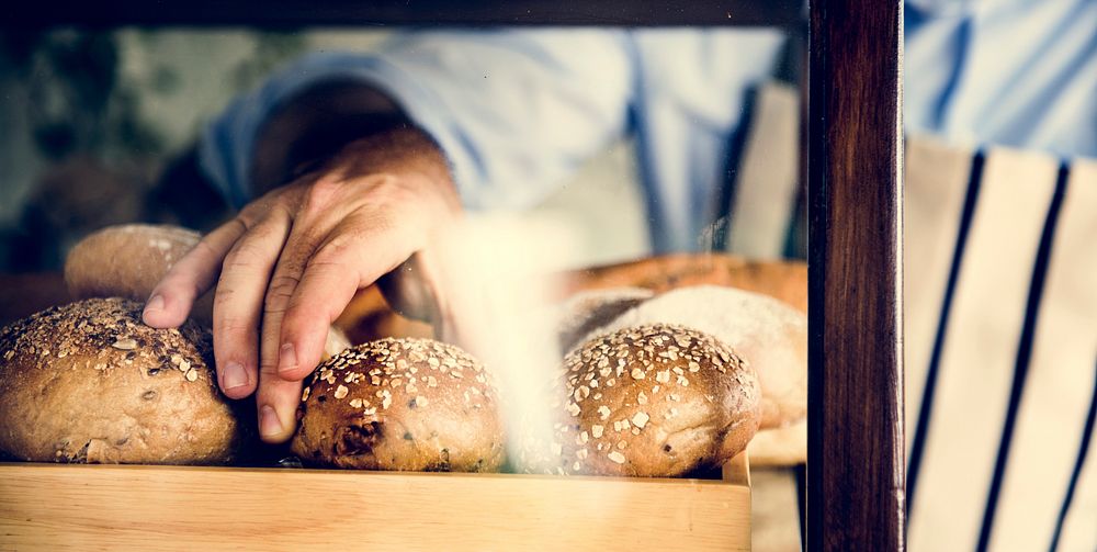 Man Hand Picking Baked Bread | Premium Photo - rawpixel